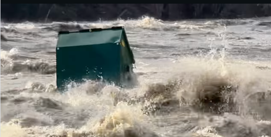 Two Dumpsters, drifting down the river